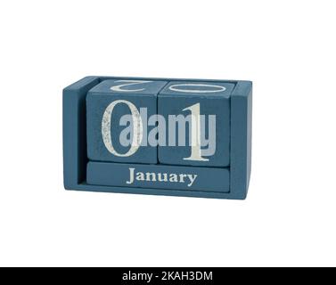 January 1st on the wooden calendar with little christmas tree on white ...