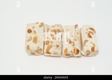 Pieces of Arabic sweet delicious Noga with peanuts,Egyptian cultural ...