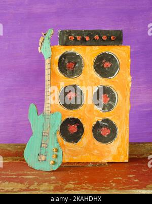 Grungy cardboard model of a guitar and an amp stack,music, live ...