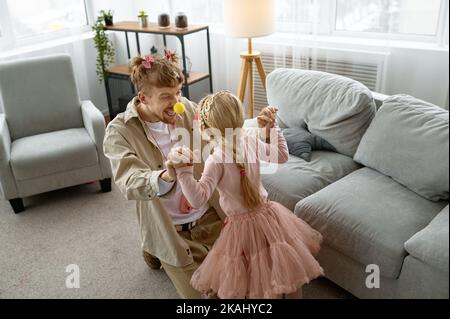 Father and daughter wearing fairies costume having fun Stock Photo - Alamy