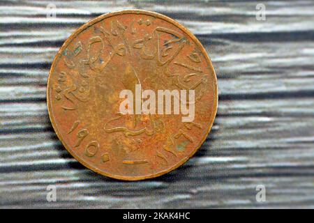 one millieme coin 1938, old Egyptian money of 1 millieme coin (the red ...