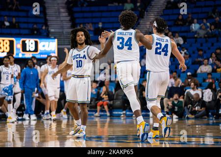 UCLA guard David Singleton celebrates during the second half of an NCAA ...