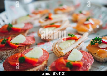 A closeup shot of small canapes arranged on a plate for an event Stock ...