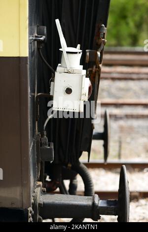 Tail-lamp on the rear coach of a train at Totnes Riverside station on ...