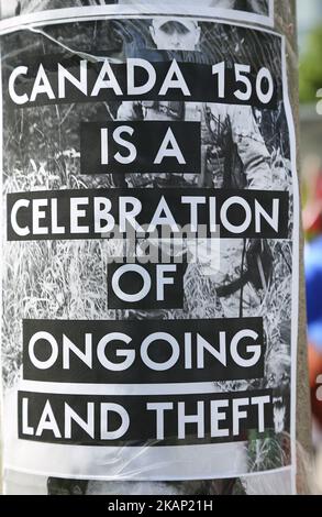 Posters protesting Canada Day and the 150th anniversary of ...