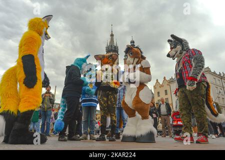Members of different Furry Fandom Conventions pose for a photo at Adam ...