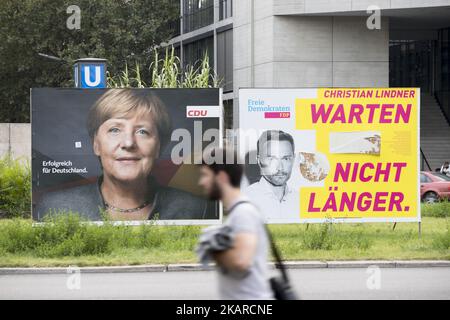 Election posters showing German Chancellor Olaf Scholz, right, and CDU ...