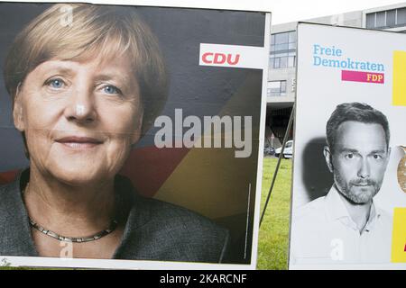 Election posters showing German Chancellor Olaf Scholz, left, and CDU ...