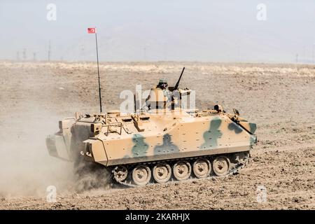 Turkish soldiers with their tanks participate in a military exercise ...