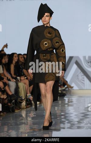 A model showcasing designer ZORAN DOBRIC's creation at the Toronto ...