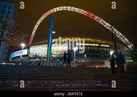The iconic Wembley Stadium is pictured by night in London on October 28 ...