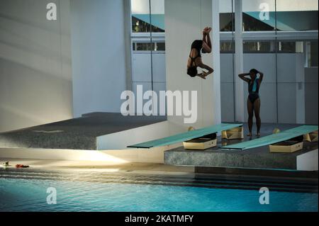 An athlete jumps in Indonesia Open Aquatic Championship (IOAC) at the ...