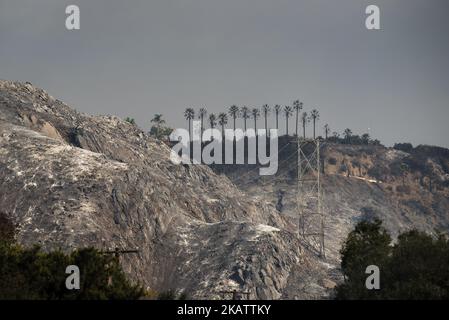 The Thomas wildfire burns in the hills behind Carpinteria High School ...