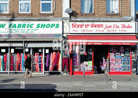 Colourful multicultural shop fronts in Southall Greater London England ...