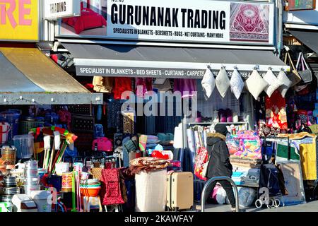 Colourful multicultural shop fronts in Southall Greater London England ...