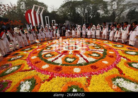 Bangladeshi girls decorates the Dhaka Central Shaheed Minar, or Martyr ...