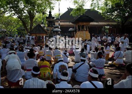 Balinese Hindus are conducting prayers at Petitenget beach on March 14 ...