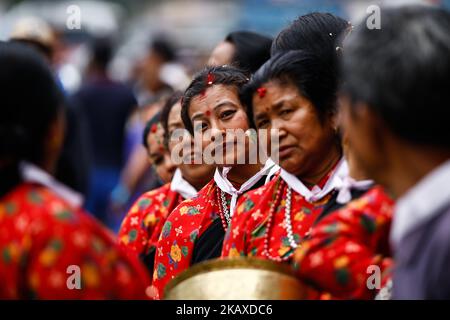 Nepalese women in traditional attire take part in the religious ...