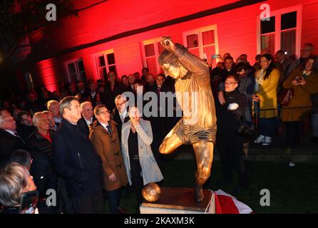 Bavaria, Nördlingen: 03 November 2022, A statue depicting the late goal ...