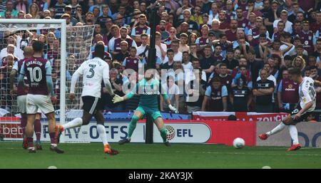 Fulham's Tom Cairney scores his side's first goal of the game during ...