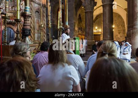 Roman Catholic monks hold a Mass in front of the Edicula, place ...