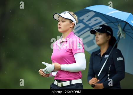 GRAND RAPIDS, MI - JUNE 16: LPGA golfer Charley Hull blows smoke from ...