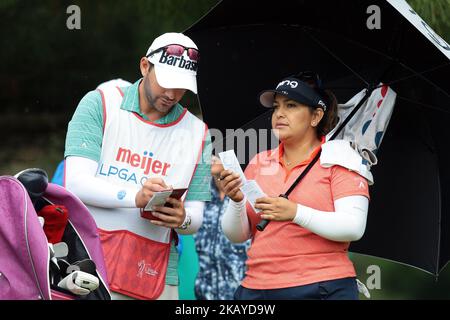 GRAND RAPIDS, MI - JUNE 16: LPGA golfer Charley Hull blows smoke from ...