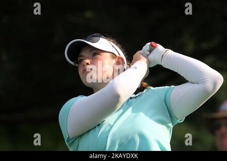 Caroline Inglis of Eugene, Oregon follows her shot from the 6th tee ...