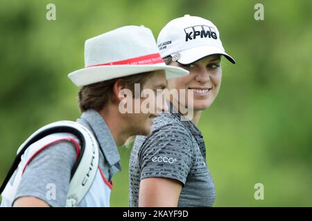 GRAND RAPIDS, MI - JUNE 16: LPGA golfer Charley Hull blows smoke from ...