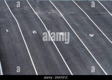 Four numbered asphalt road lanes Stock Photo - Alamy