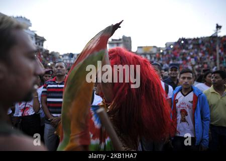 A mask dancer 'Lakhay', dancing in the traditional ritual tunes of ...