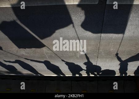Indonesian Muslims carrying Tawheed flags and other attributes staged ...