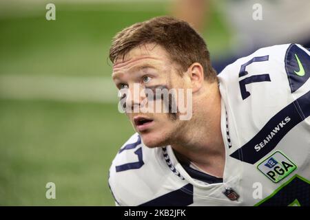 Seattle Seahawks offensive guard Ethan Pocic (77) pays tribute to ...