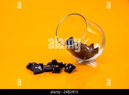 keyboard button in glass in jar in bucket on orange background isolated ...