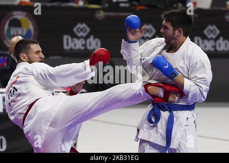 Male karate fight in the elimination round of Kumite by teams during ...