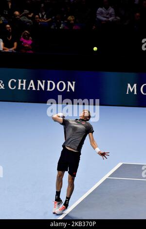 Kevin Anderson, of South Africa, serves to Jenson Brooksby during a ...