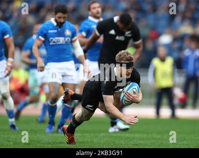New Zealand's Damian McKenzie scores their side's third try during the ...