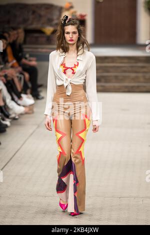 A model walks the runwayat Marina Hoermanseder Fashion Show during ...
