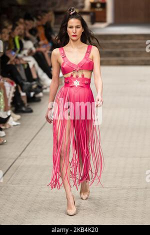 A model walks the runwayat Marina Hoermanseder Fashion Show during ...
