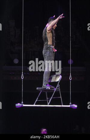 Acrobat performs during entertainment in the park behind Tien An Mien ...