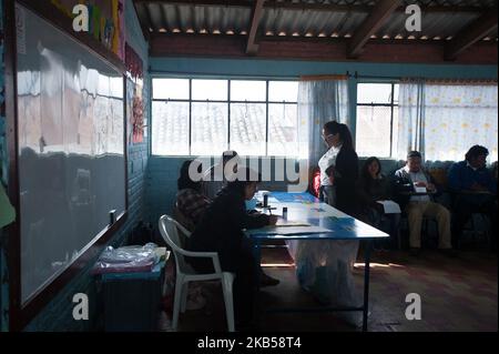 Voters arrive to a polling station during the presidential election in ...