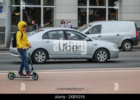 Uber driver driving an Uber Russia (joint venture with Yandex taxi ...