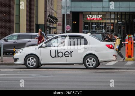 Uber driver driving an Uber Russia (joint venture with Yandex taxi ...