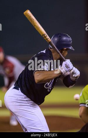 Alex Robles of Tigres de Quintana Roo #38 hits against of Diablos Rojos ...