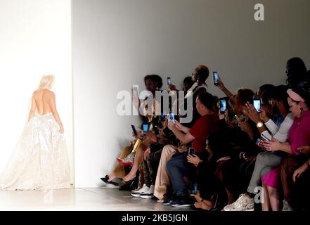 A model walks the runway for Portia & Scarlett for Fashion Palette ...