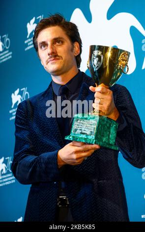 Italian actor Luca Marinelli holds the Coppa Volpi for Best Actor he ...