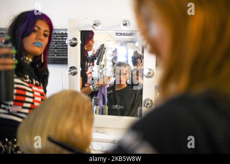 Models are seen in the backstage prior to the FAD catwalk during London ...