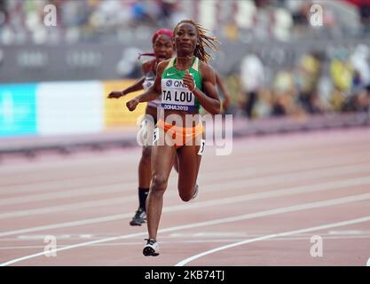 Marie-Josée Ta Lou competing in the 100 meters of the Tokyo 2020 ...