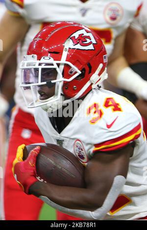 Kansas City Chiefs running back Clyde Edwards-Helaire, left, celebrates ...