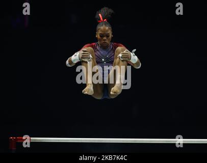 Shilese Jones of USA (women's uneven parallel or asymmetric bars ...